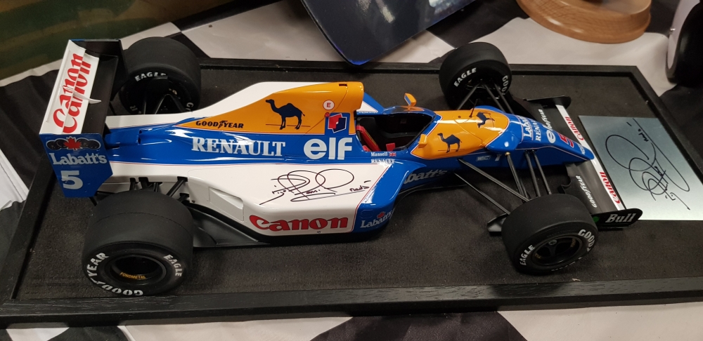 Nigel Mansell 1/12 Williams model , signed on the car especially for us ...